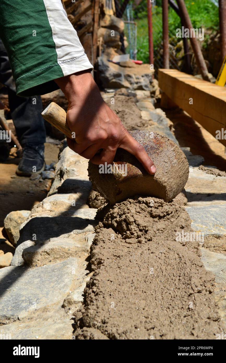 Construction worker plastering wall surface hi-res stock photography ...