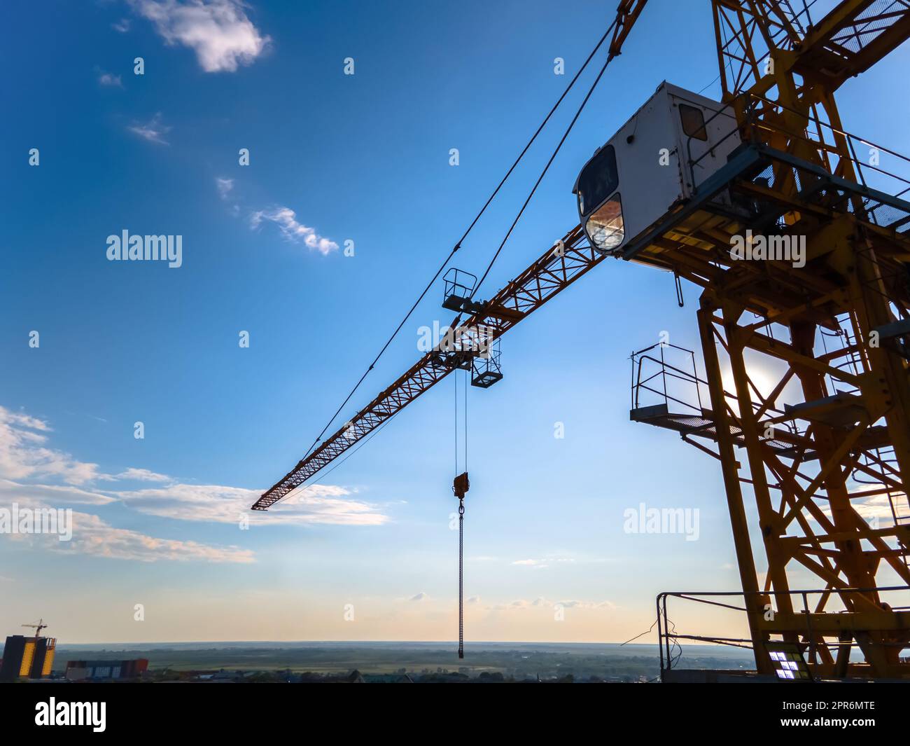 Construction crane on the background of a clear day sky aerial view ...