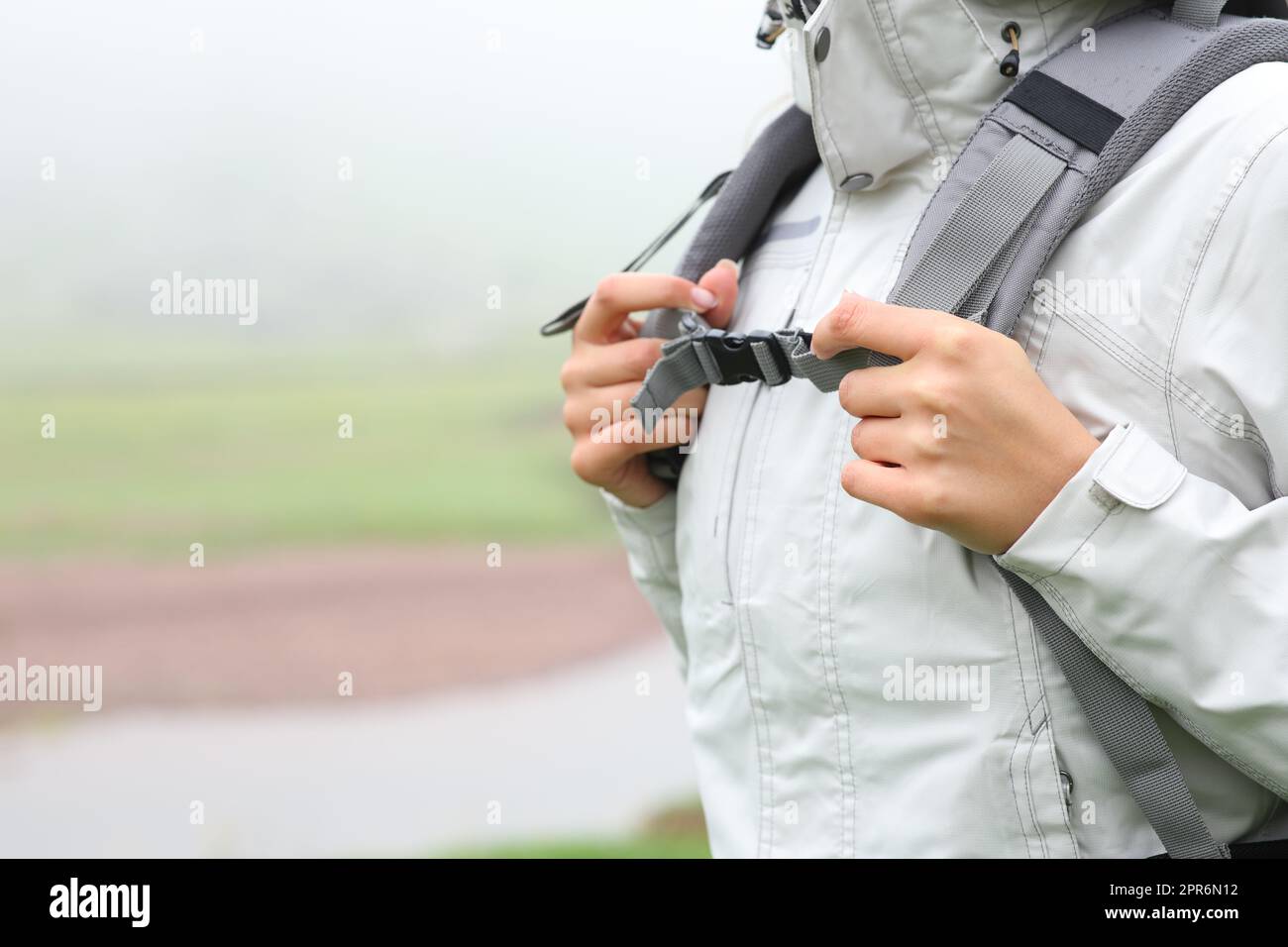 Hiker hands catching backpack ready to walk Stock Photo - Alamy