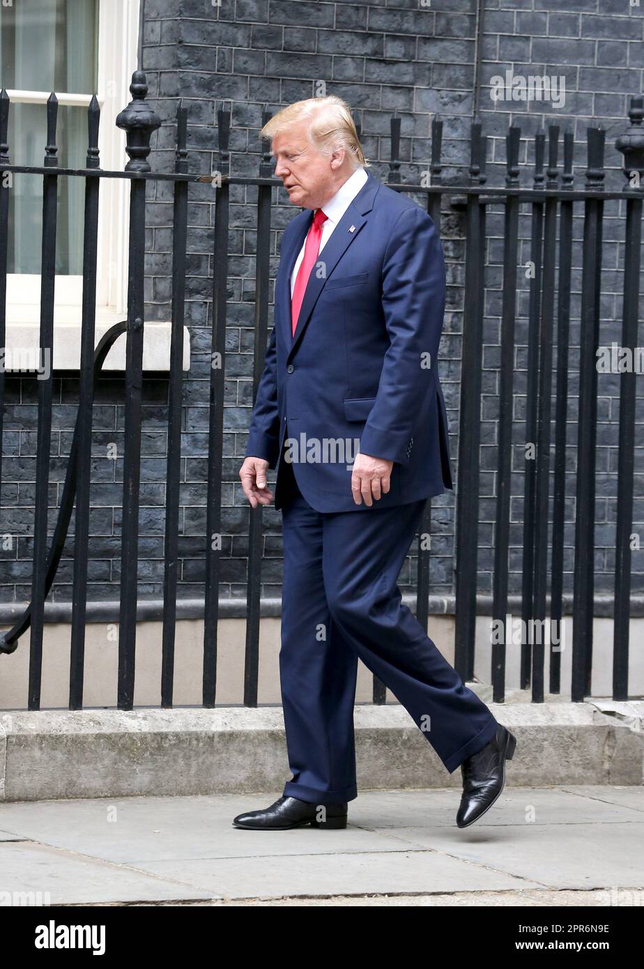 US President Donald Trump arrives at Number 10 Downing Street in London ...