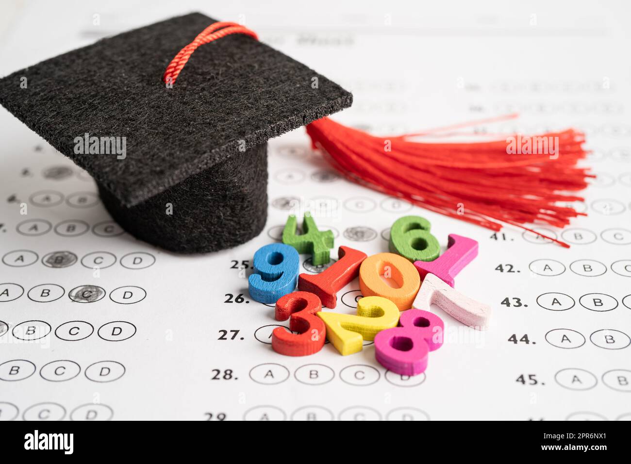 Math Number colorful with graduation hat and pencil on Answer sheet ...