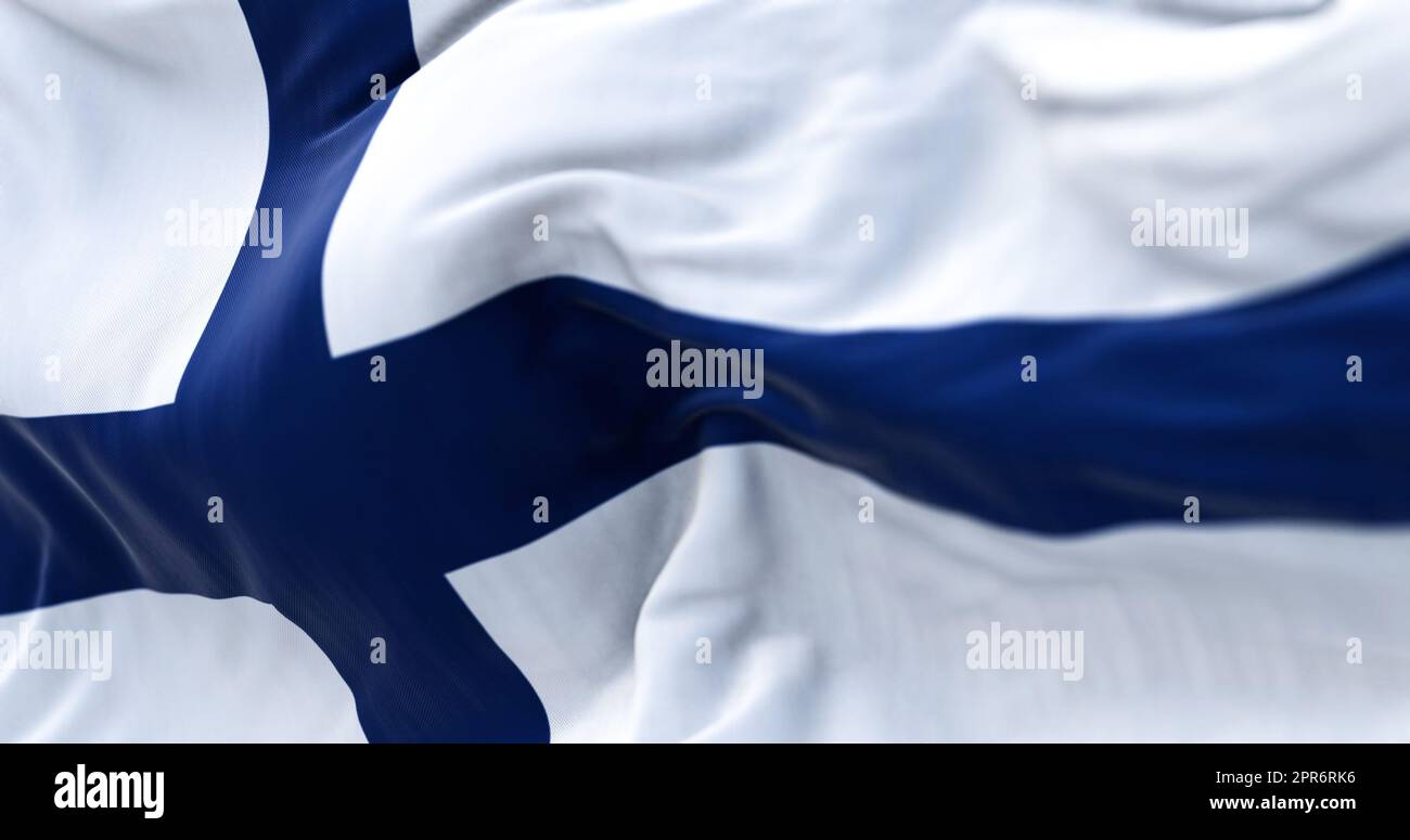 Close-up view of Finland national flag waving in the wind Stock Photo ...