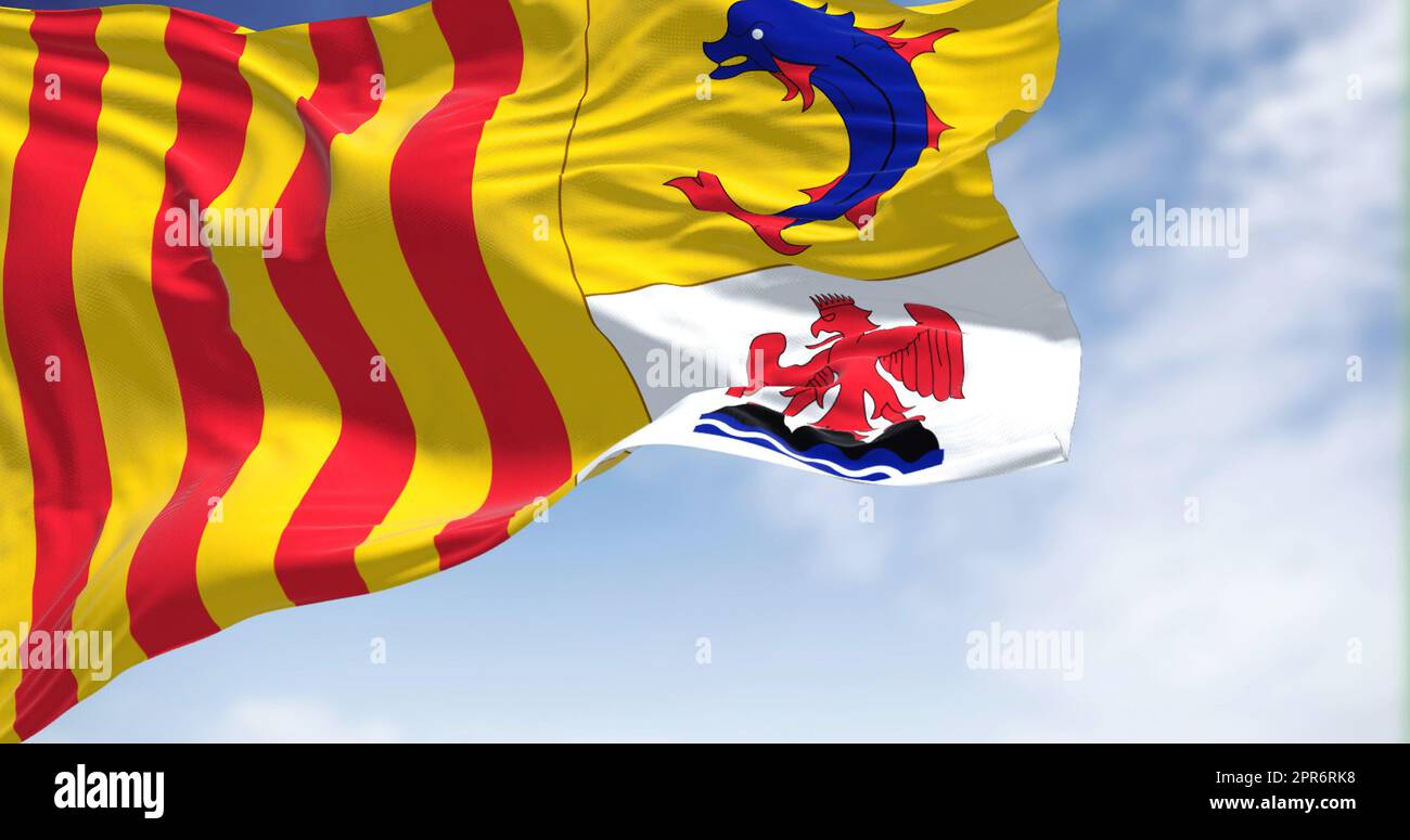 The region flag of Provence-Alpes-Côte d'Azur waving in the wind on a ...