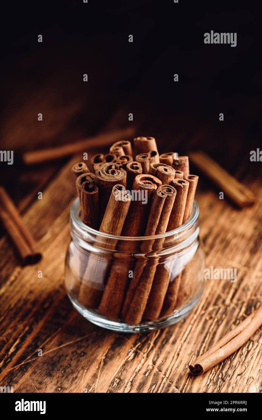 Cinnamon sticks in a glass jar Stock Photo - Alamy