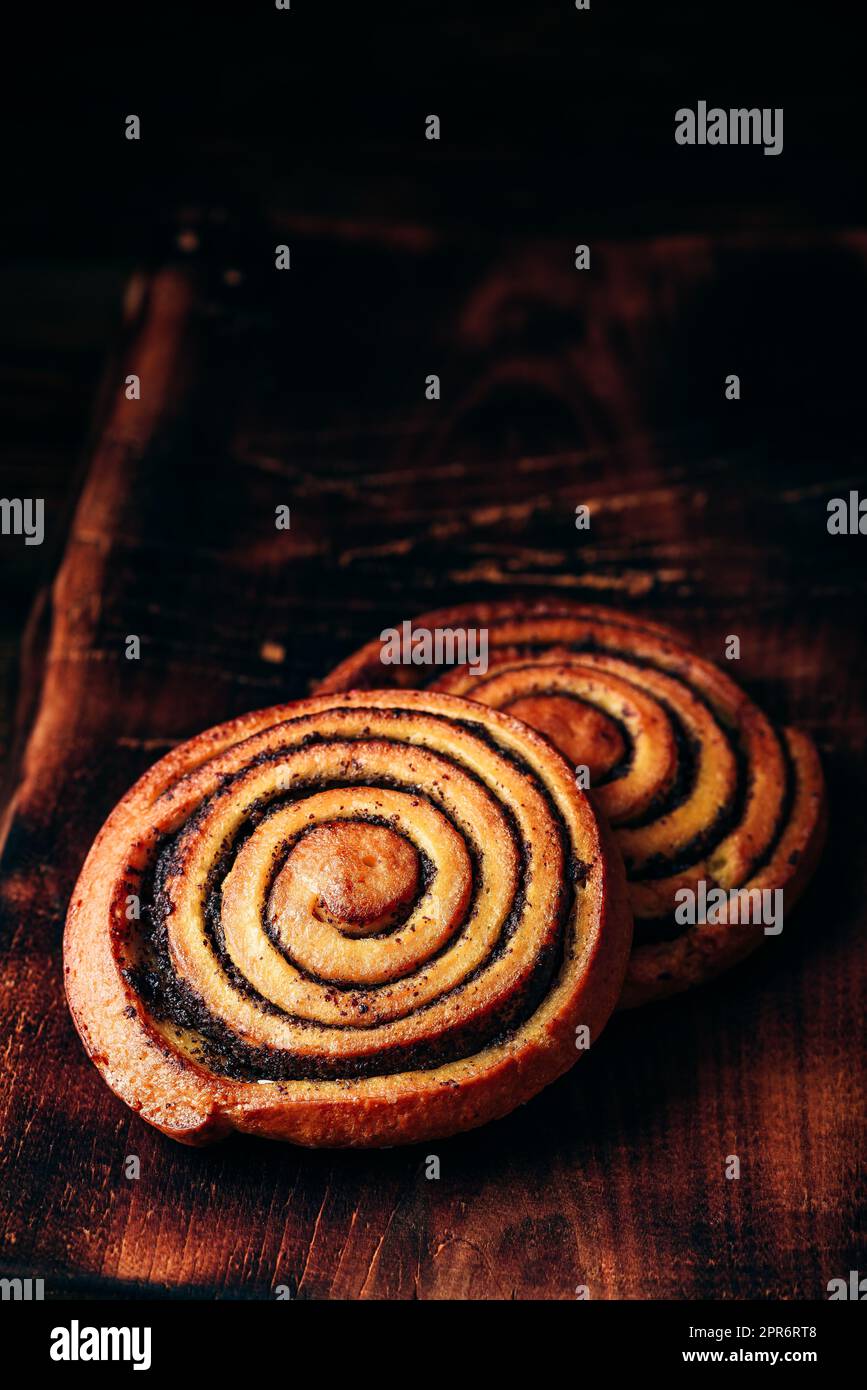 Sweet roll with poppy seeds Stock Photo - Alamy
