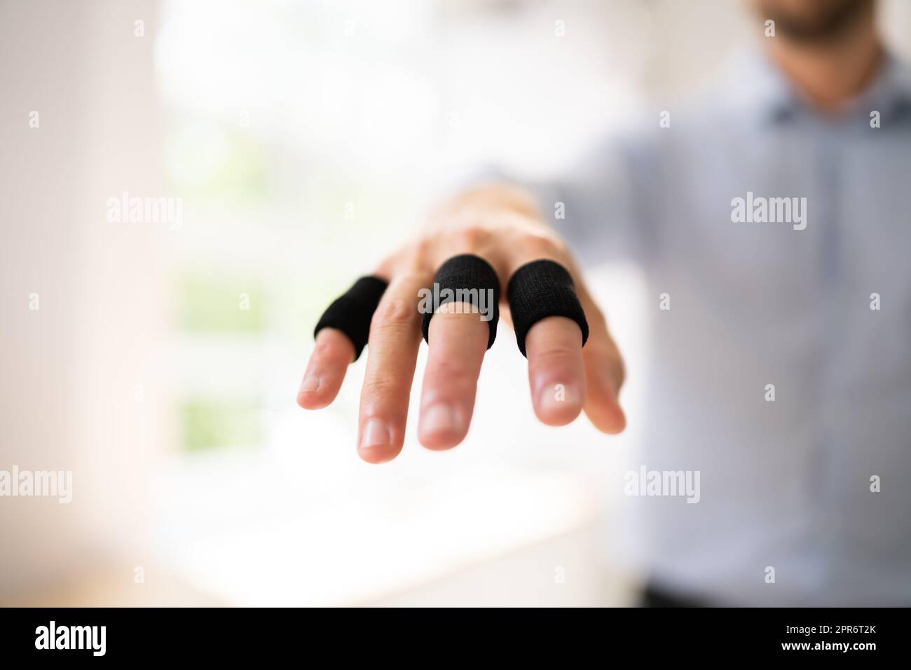 Broken Man Hand Splint Bandage Stock Photo - Alamy