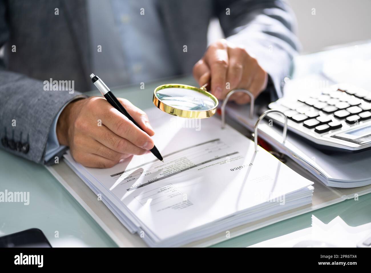 Audit And Fraud Investigation. Auditor Using Magnifying Glass Stock ...