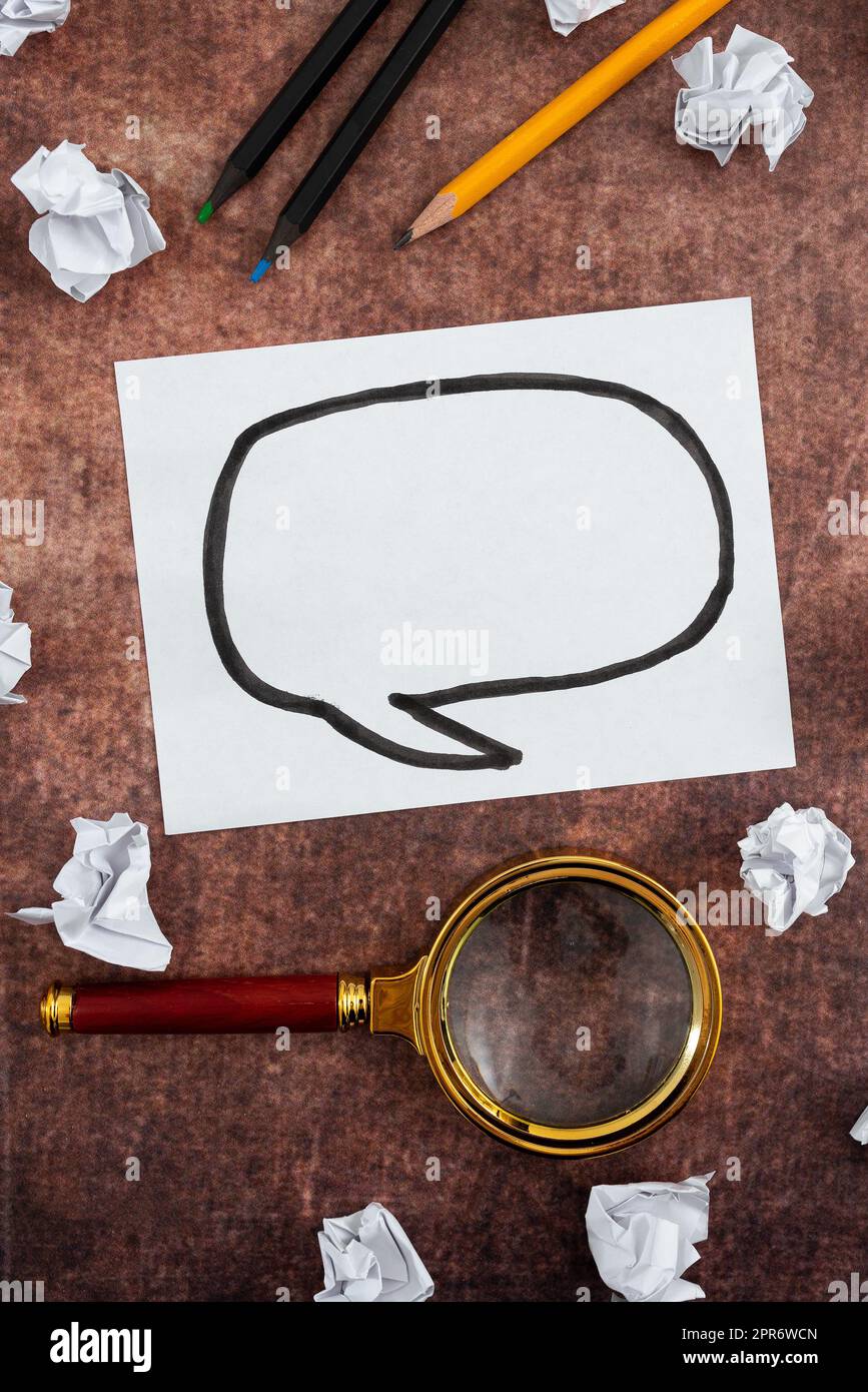 Paper With Speech Bubble Drawing, Magnifying Glass And Pencil ...