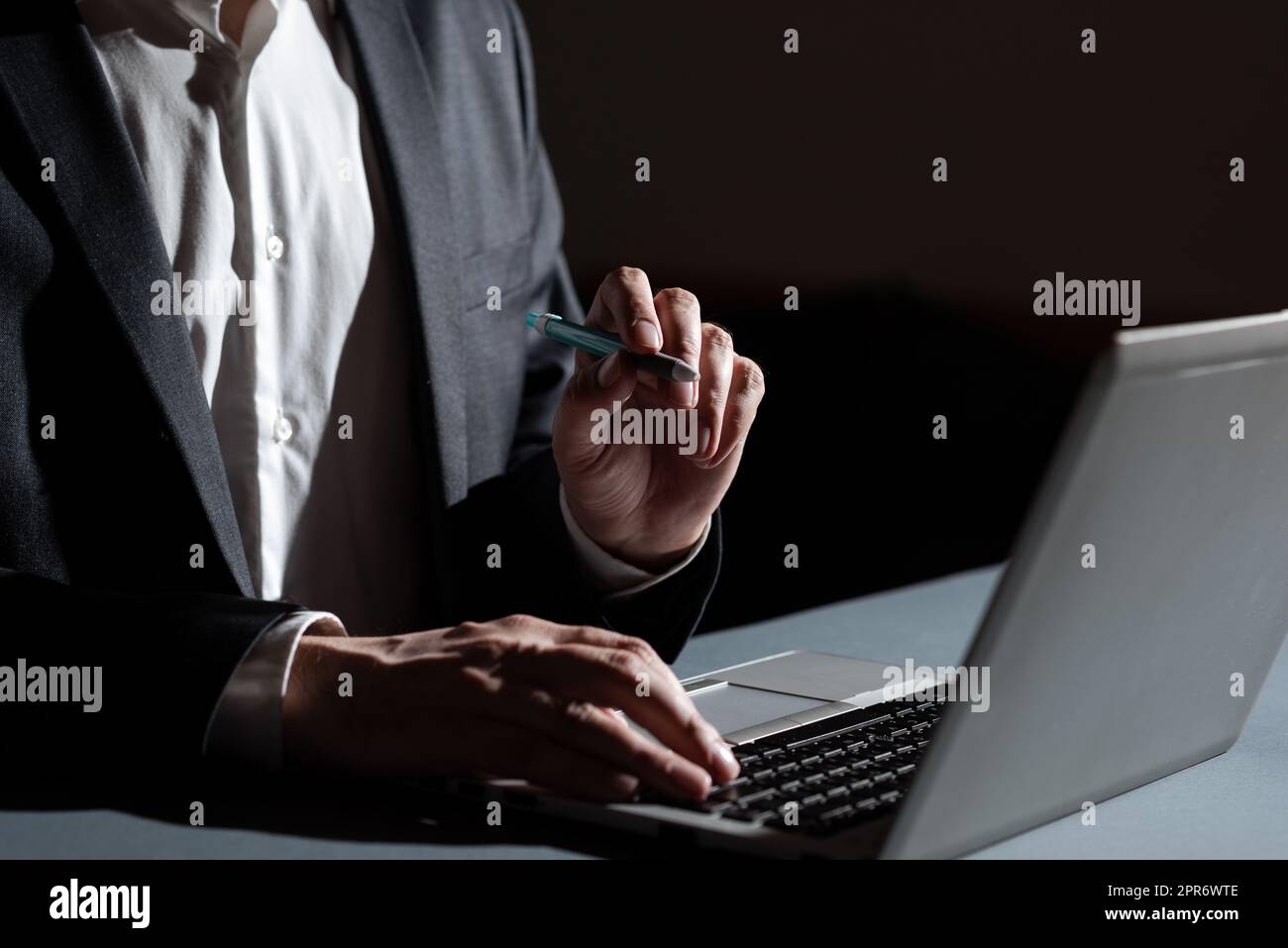 Businessman Typing Important Concept Into Lap Top And Pointing New Idea ...