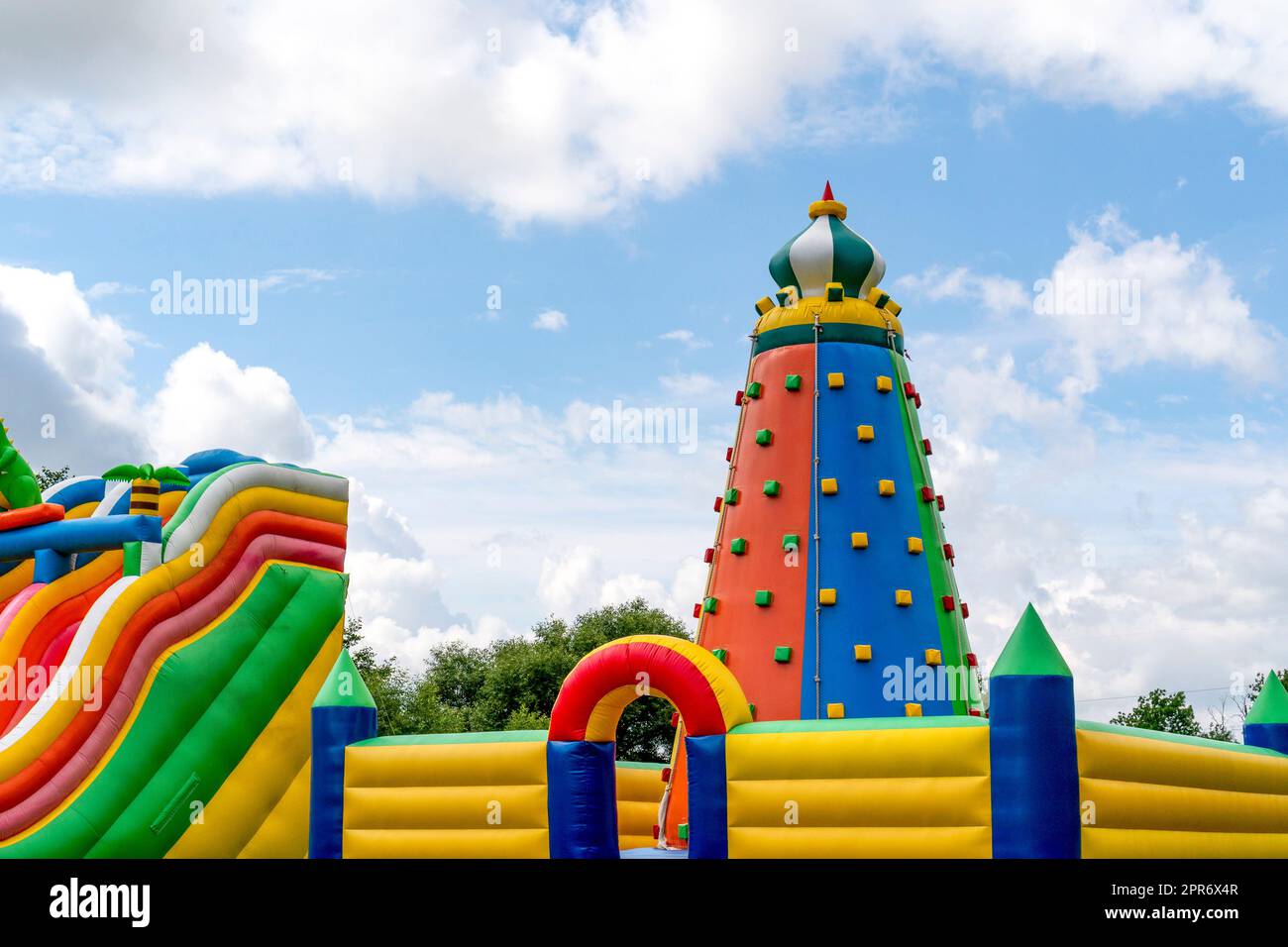 Inflatable climbing tower and obstacle course slide for kid games Stock ...