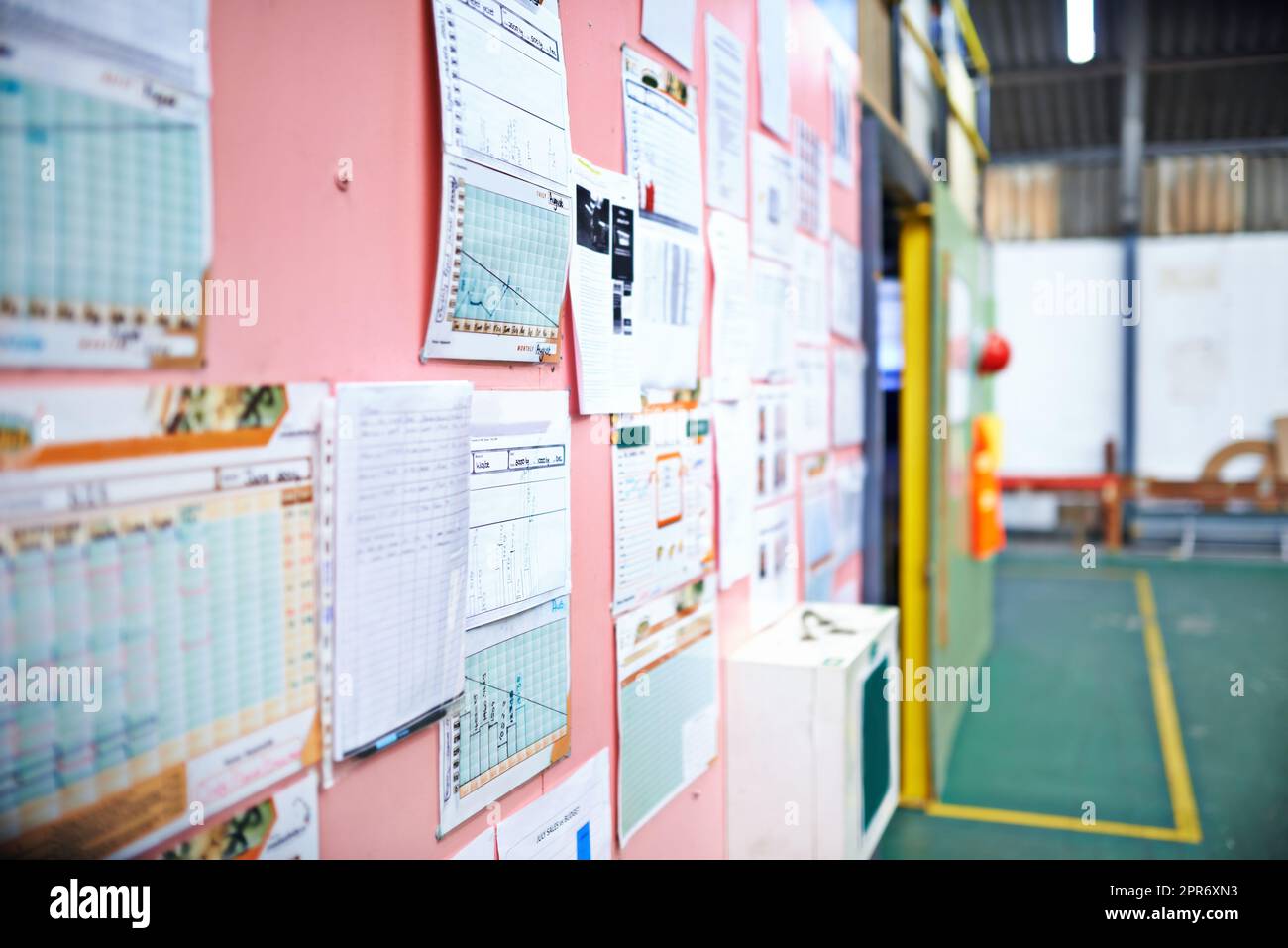 Punch out time. Shot of a schedule board inside a factory Stock Photo ...