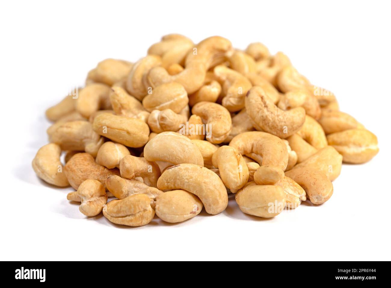 Cashew kernels against white background Stock Photo - Alamy