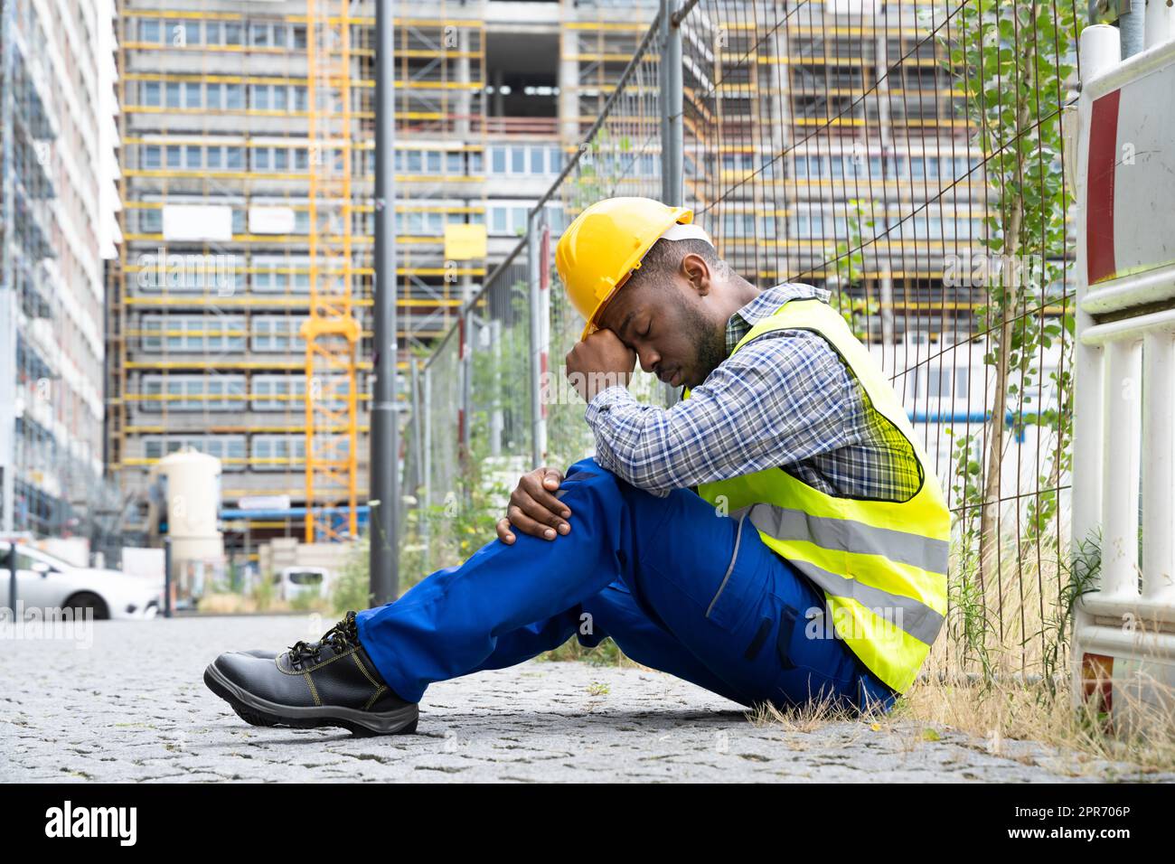 Unhappy Sad Construction Worker Stock Photo - Alamy
