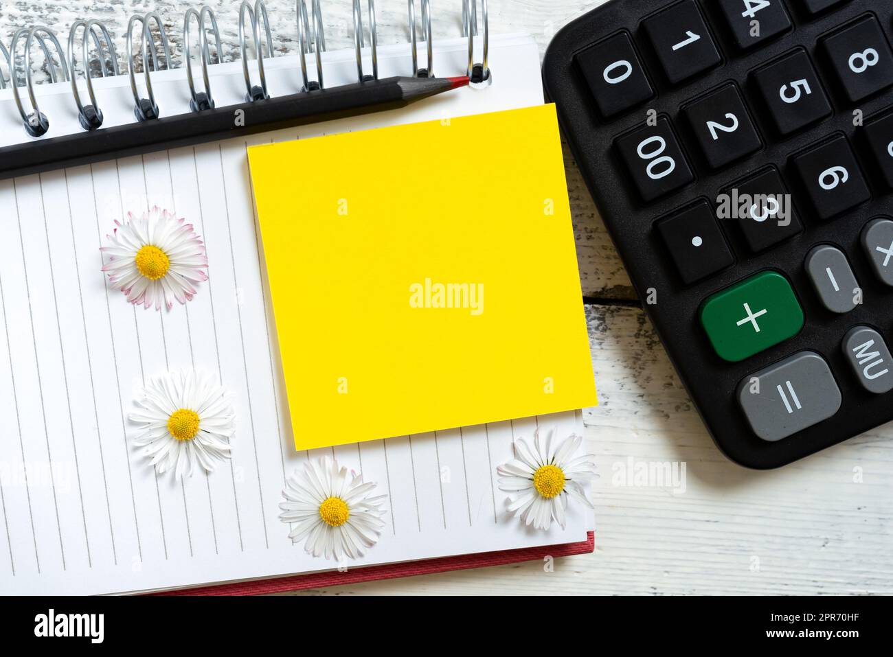Sticky Note With Important Message Over Notebook With Pencil And Flowers On Desk With Calculator ...