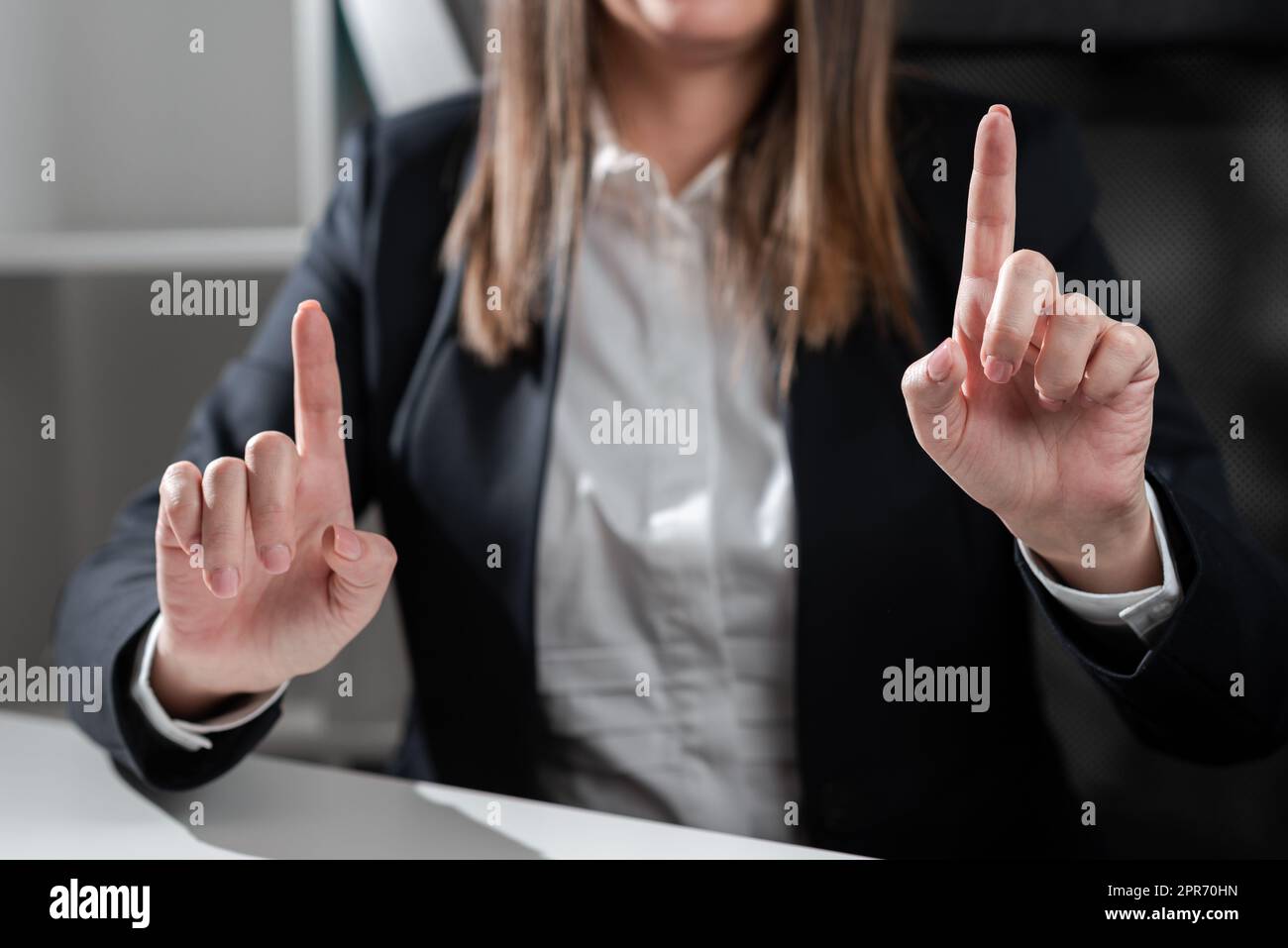Businesswoman Pointing With Two Fingers On Important Messages ...
