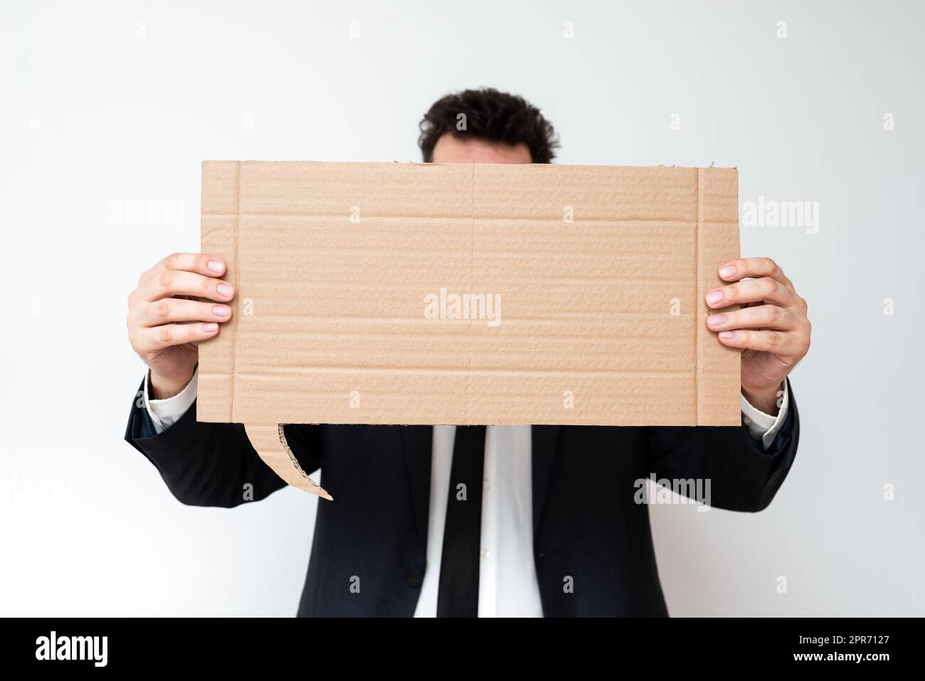 Businessman Holding Speech Bubble With Important Messages. Man In Suit ...