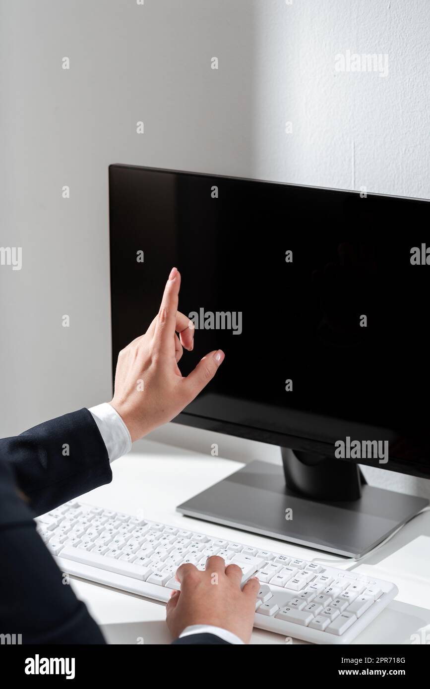 Businesswoman Typing Recent Updates On Lap Top Keyboard On Desk And ...