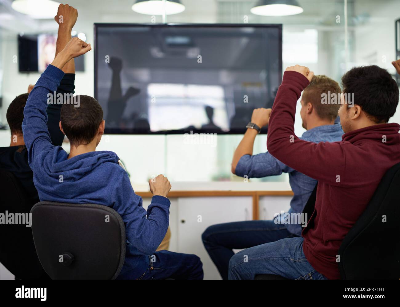 Group watching rear view hi-res stock photography and images - Alamy