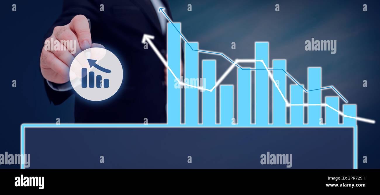 Businessman With Pen Pointing On A Chart And Presenting Crucial Graphs ...