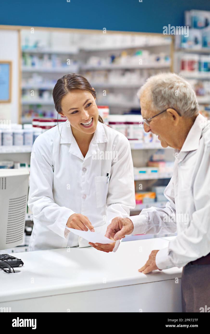 Pharmacist patient prescription pharmacy counter hi-res stock ...