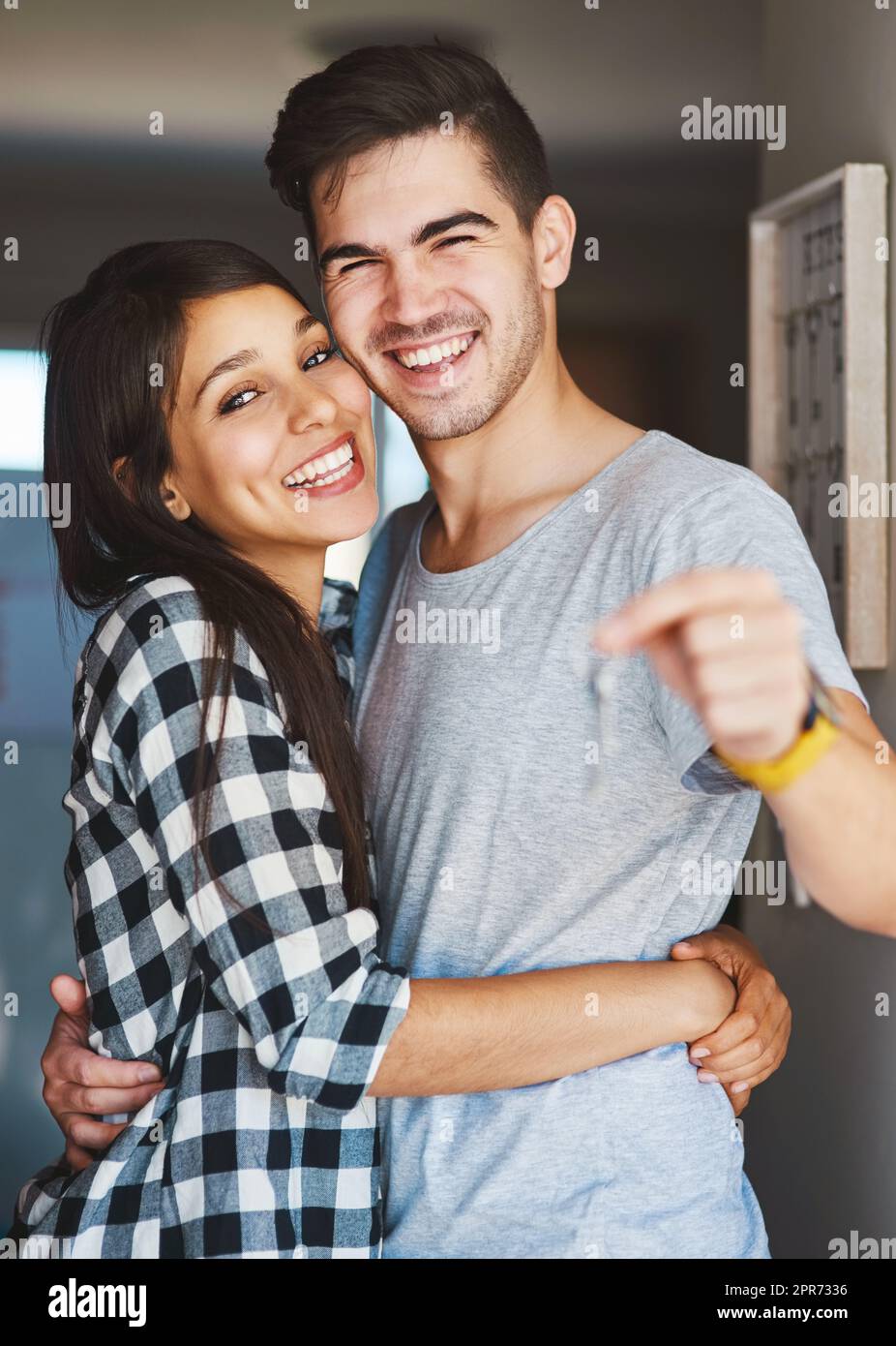 We Couldnt Be Happier Portrait Of A Happy Young Couple Standing In The