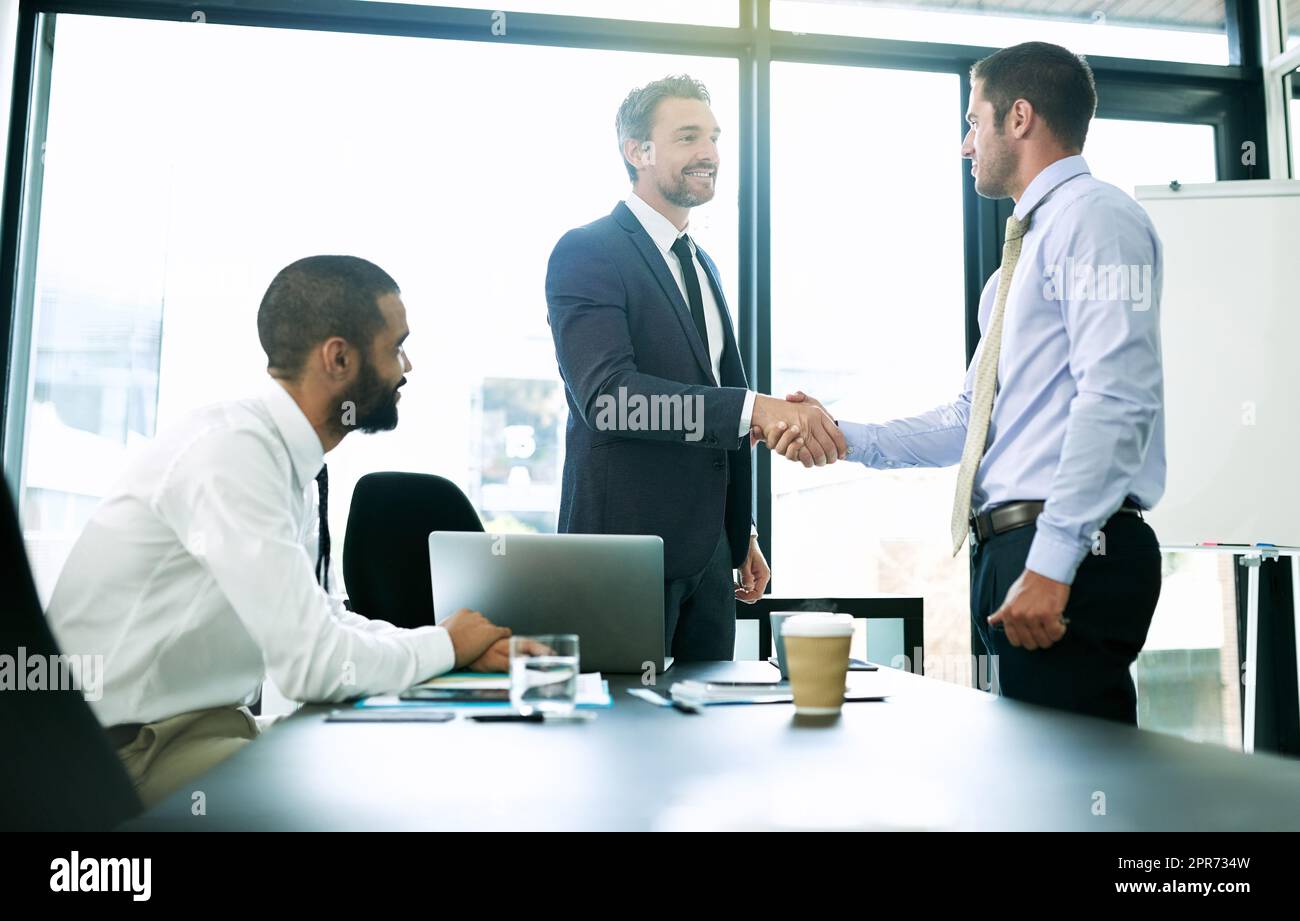 Getting the best of both business worlds with a merger. Shot of ...