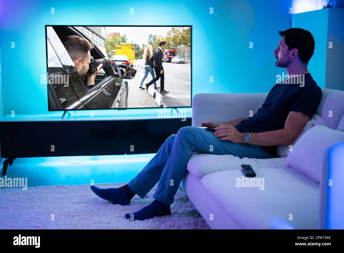 Streaming And Watching Movie On TV Screen Stock Photo - Alamy