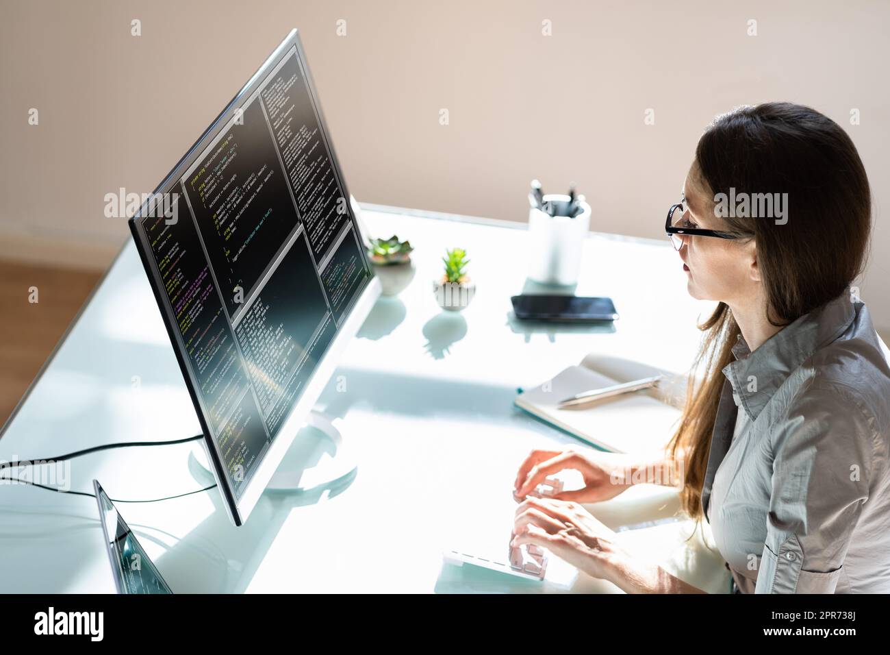 Programmer Woman Coding On Computer. Coder Girl Stock Photo - Alamy