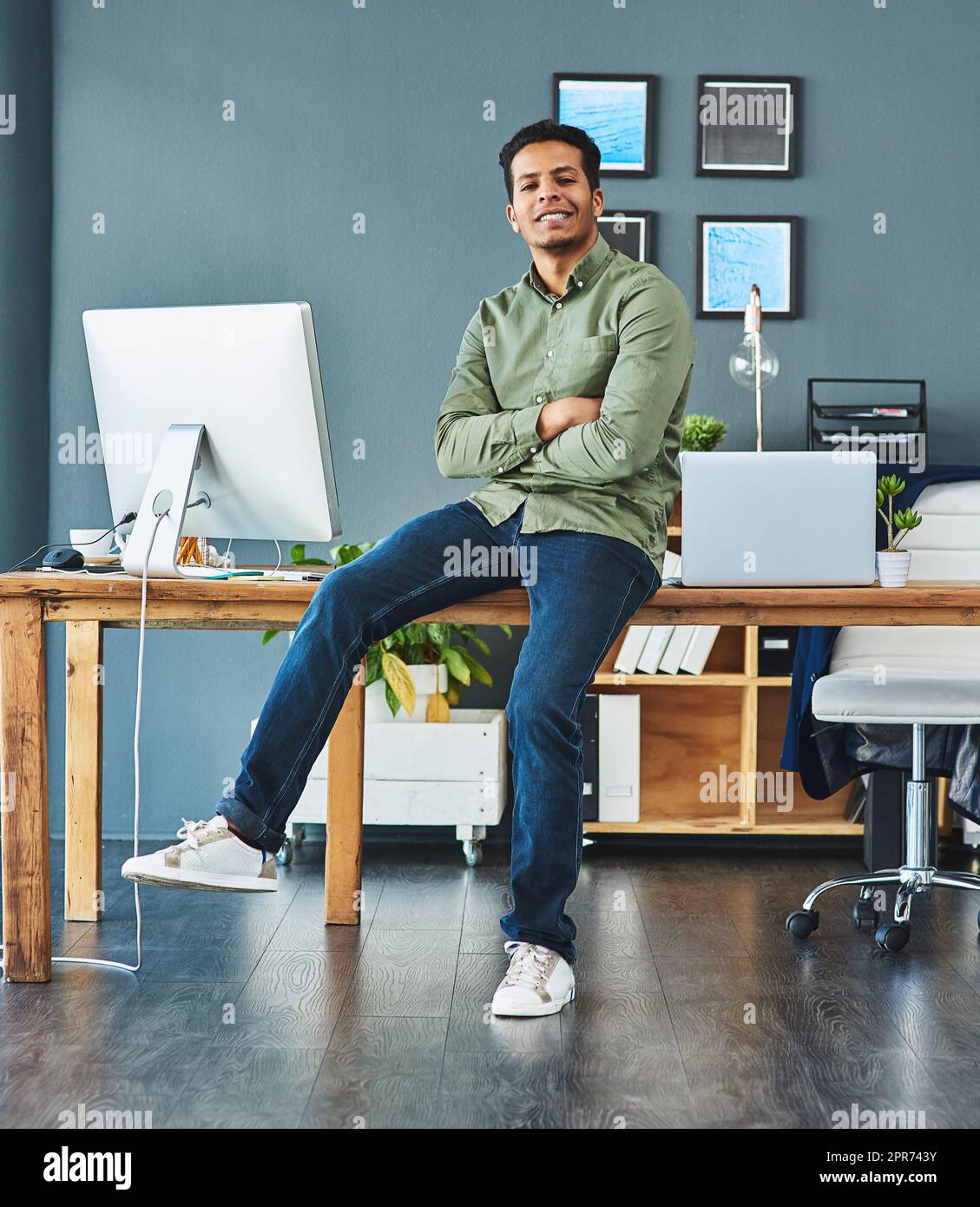 Young indian boss hi-res stock photography and images - Alamy