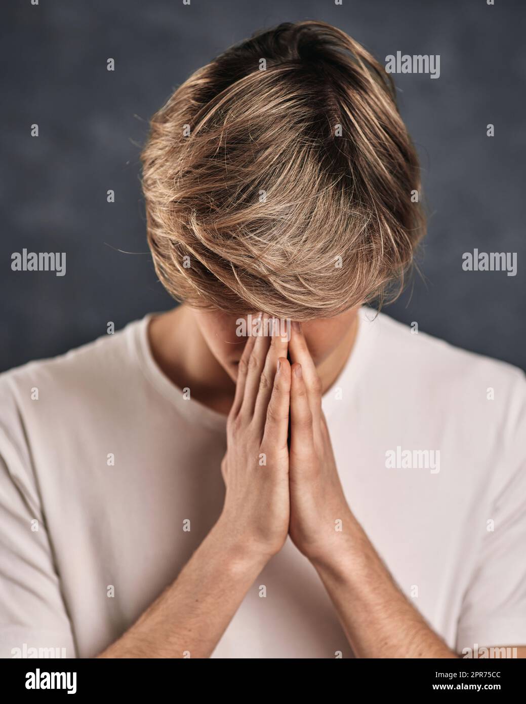 guy pray for peace in the world Stock Photo - Alamy