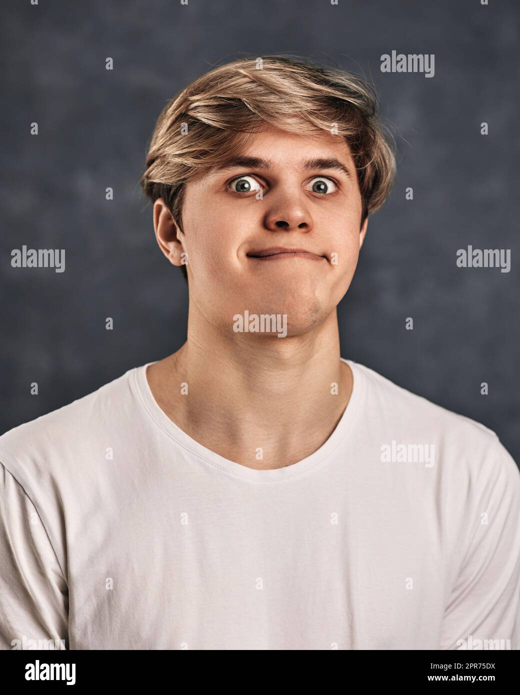 Handsome man face awkward hi-res stock photography and images - Alamy
