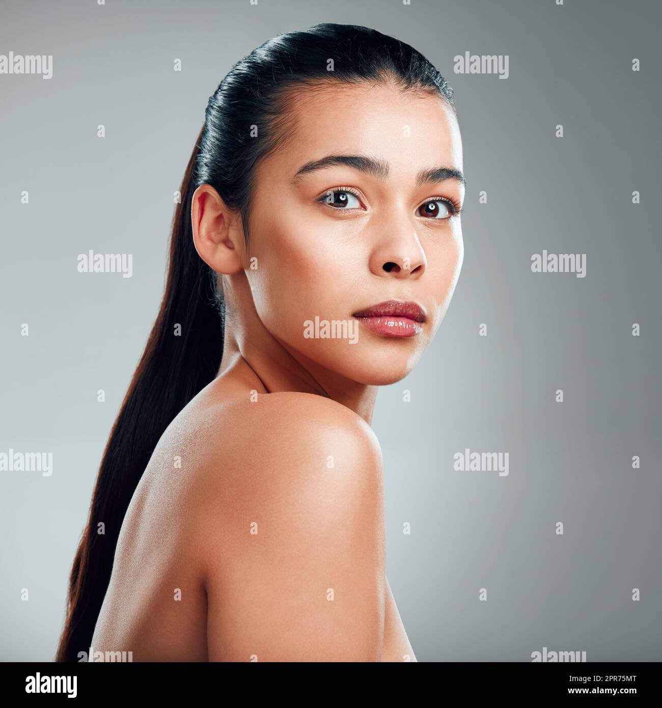 Your skin deserves love and affection. Studio shot of a beautiful young ...