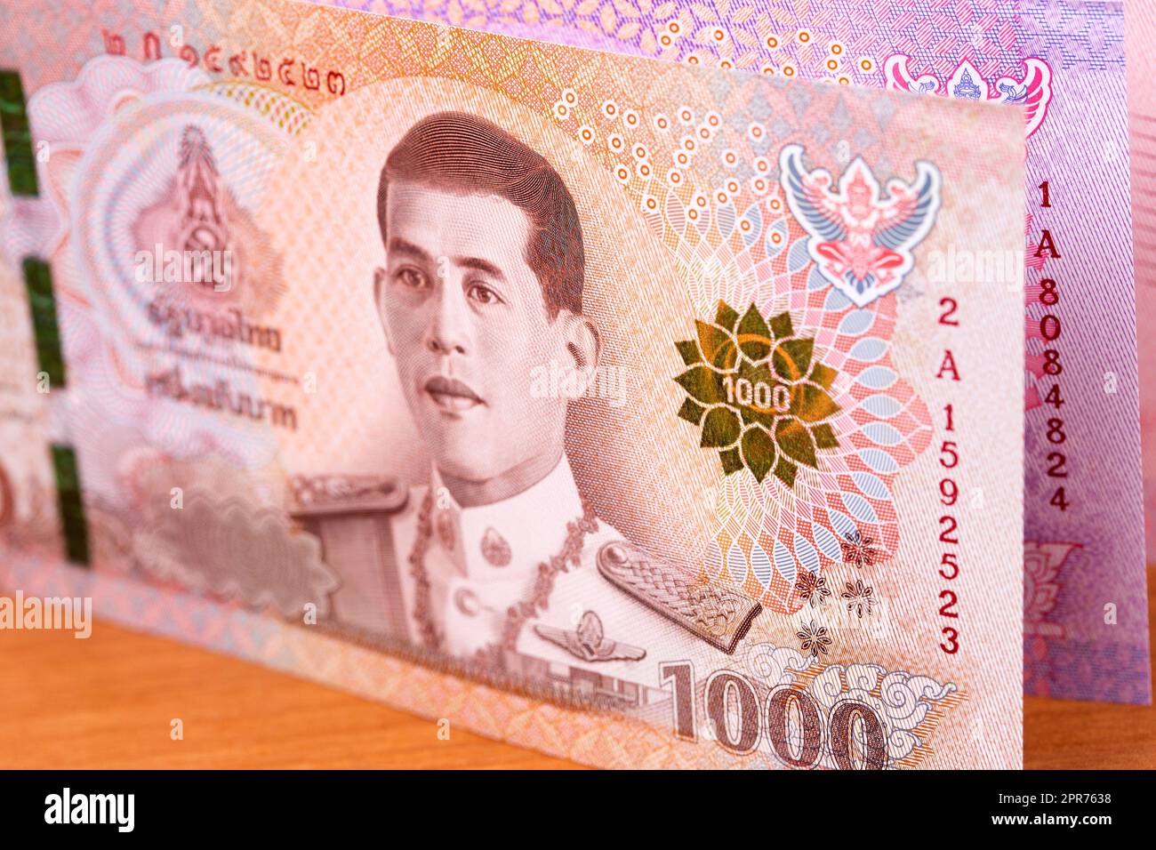 Thai money - baht a background Stock Photo - Alamy