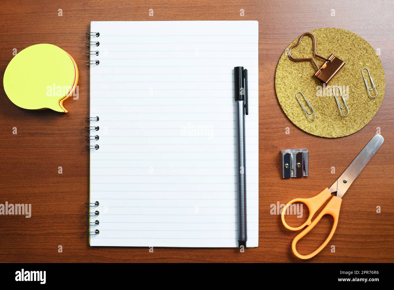 Notebook With Important Message On Desk With Office Supplies Stock ...