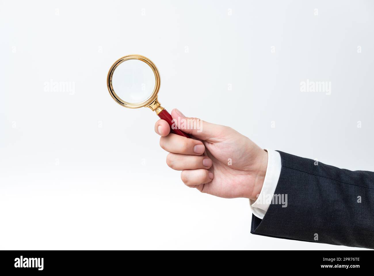Businessman Holding Magnifier In One Hand. Man Having Magnifying Glass ...