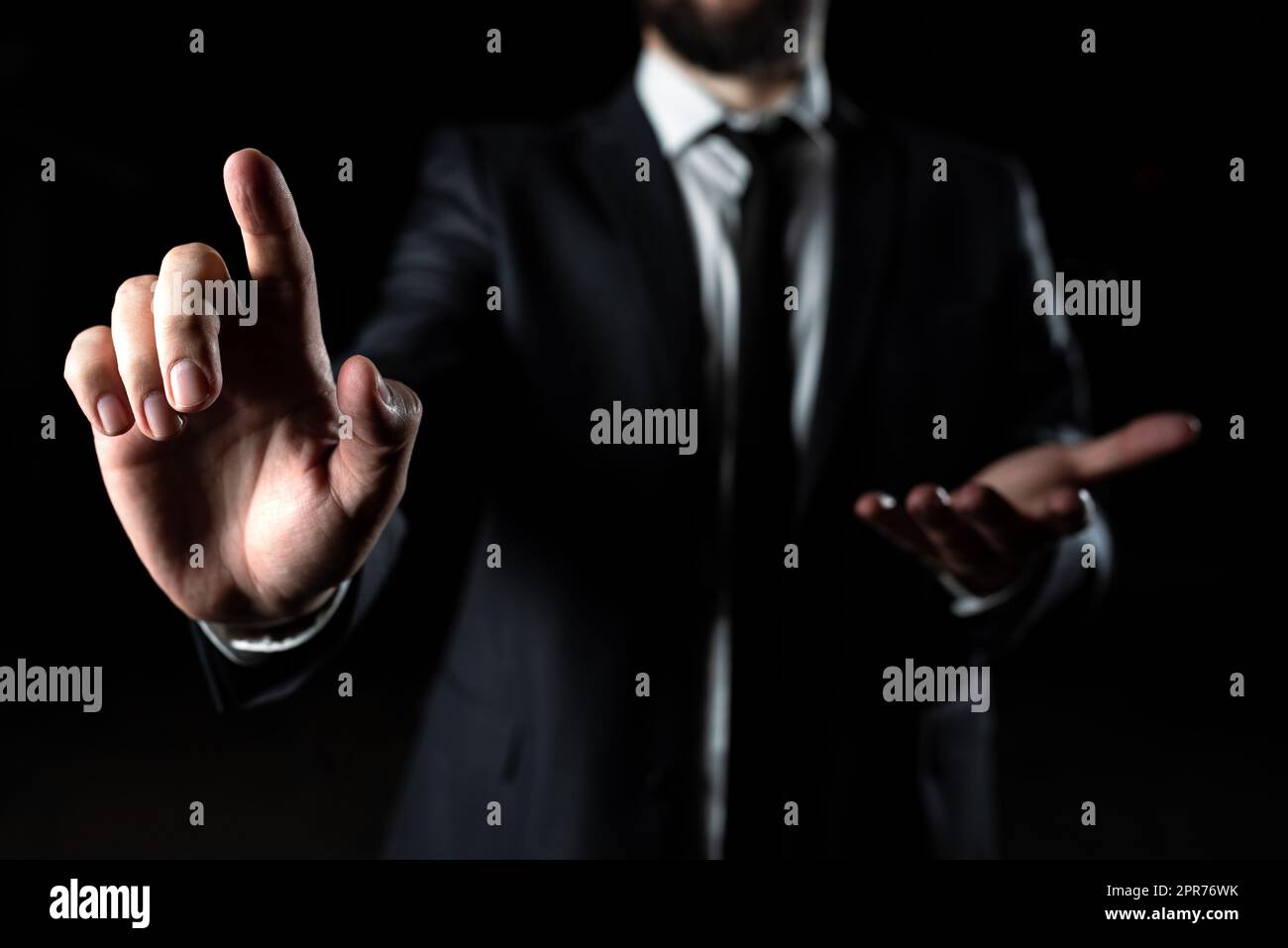 Man hand pointing suit hi-res stock photography and images - Alamy