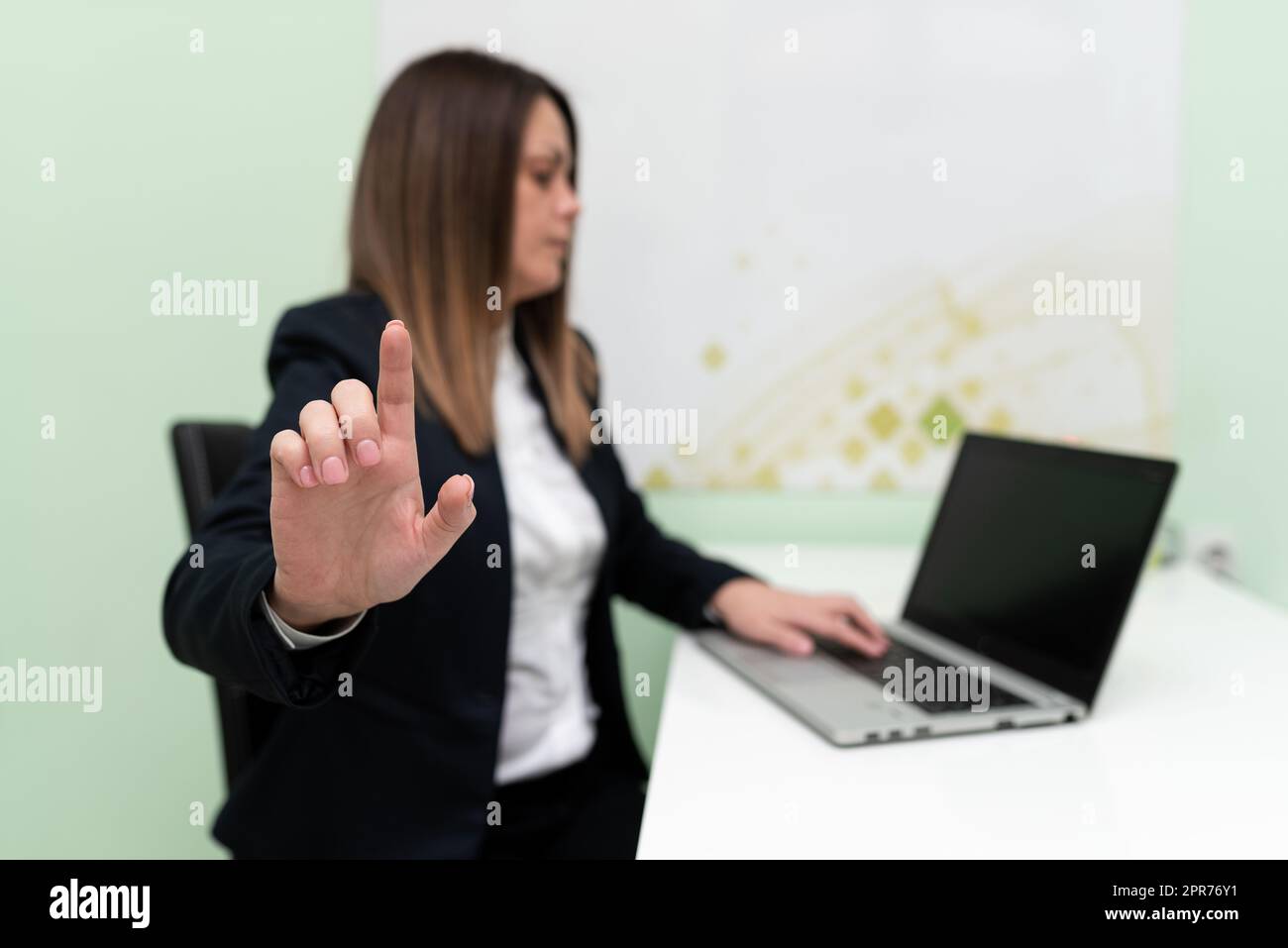 Businesswoman Typing Recent Updates On Lap Top Keyboard On Desk And ...