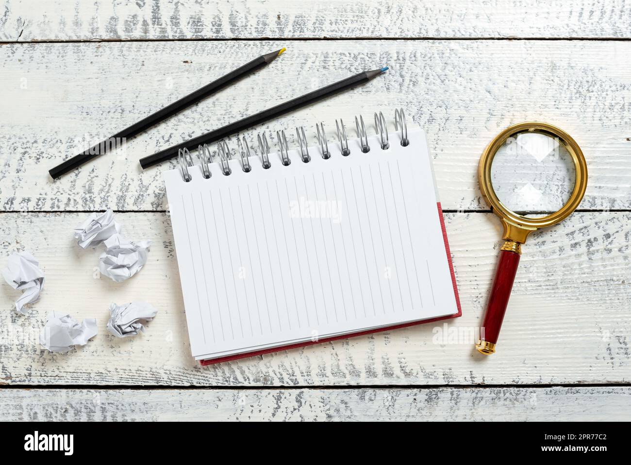Notebook With Important Message On Floor With Paper Wraps, Magnifier ...