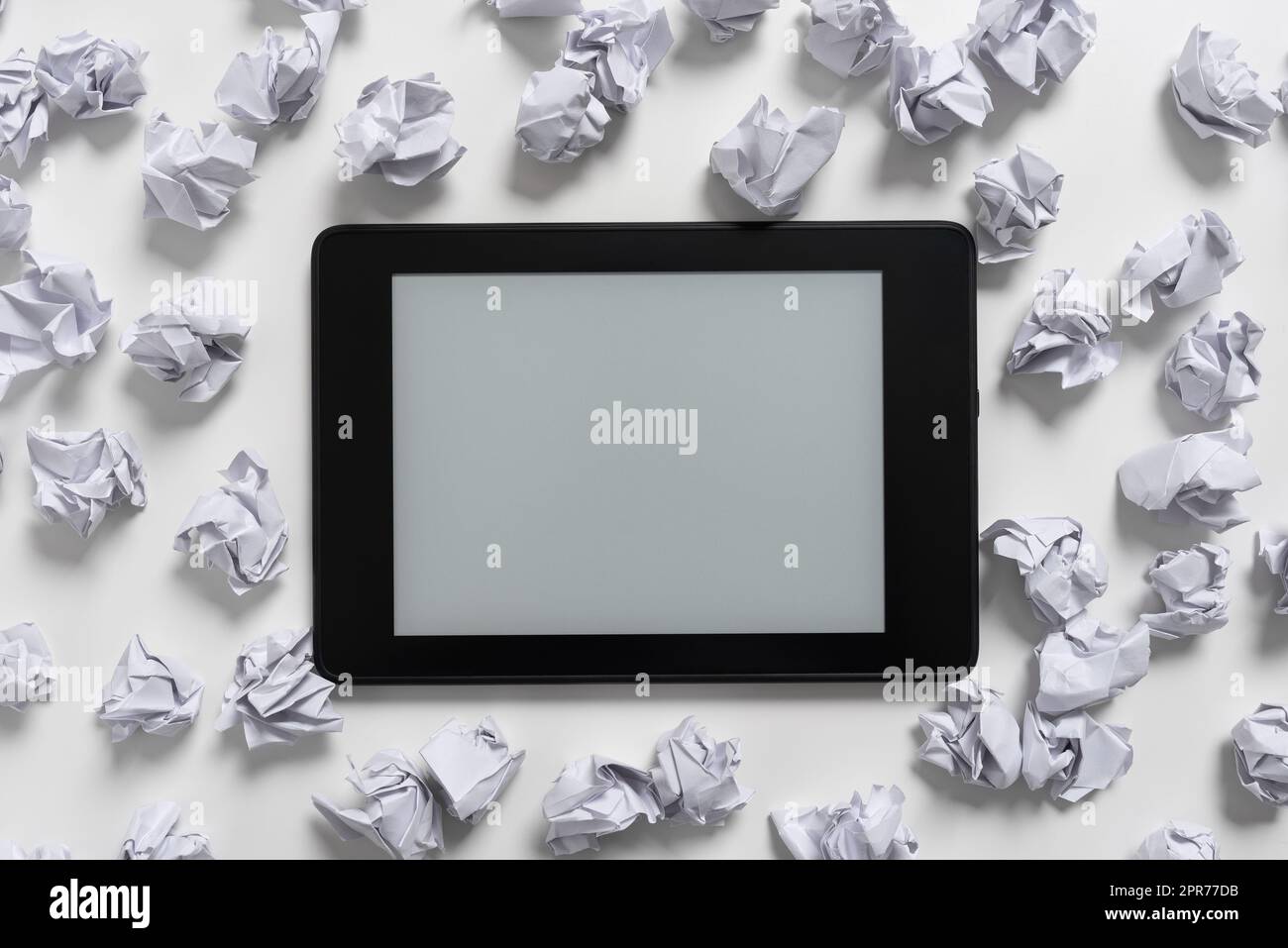Tablet Screen With Important Message On It Surrounded With Paper Wraps ...