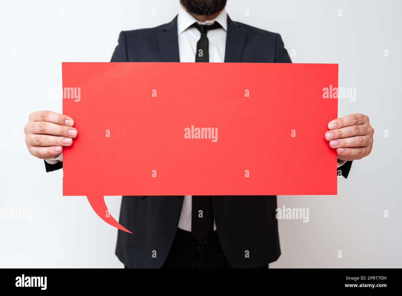 Businessman Holding Speech Bubble With Important Messages. Man In Suit ...