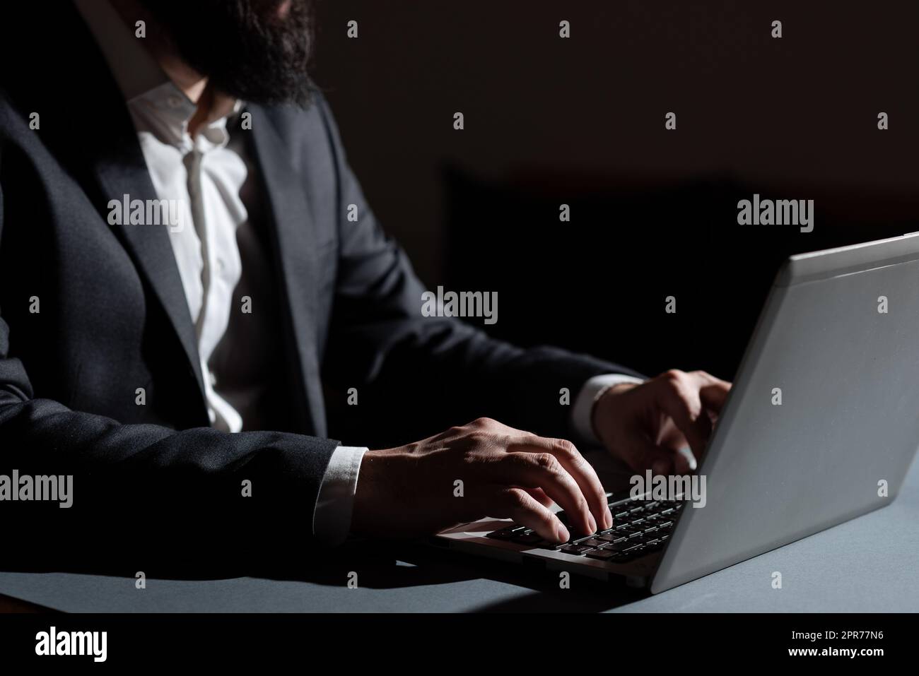 Businessman Typing Important Informations Into Lap Top. Man In Suit ...