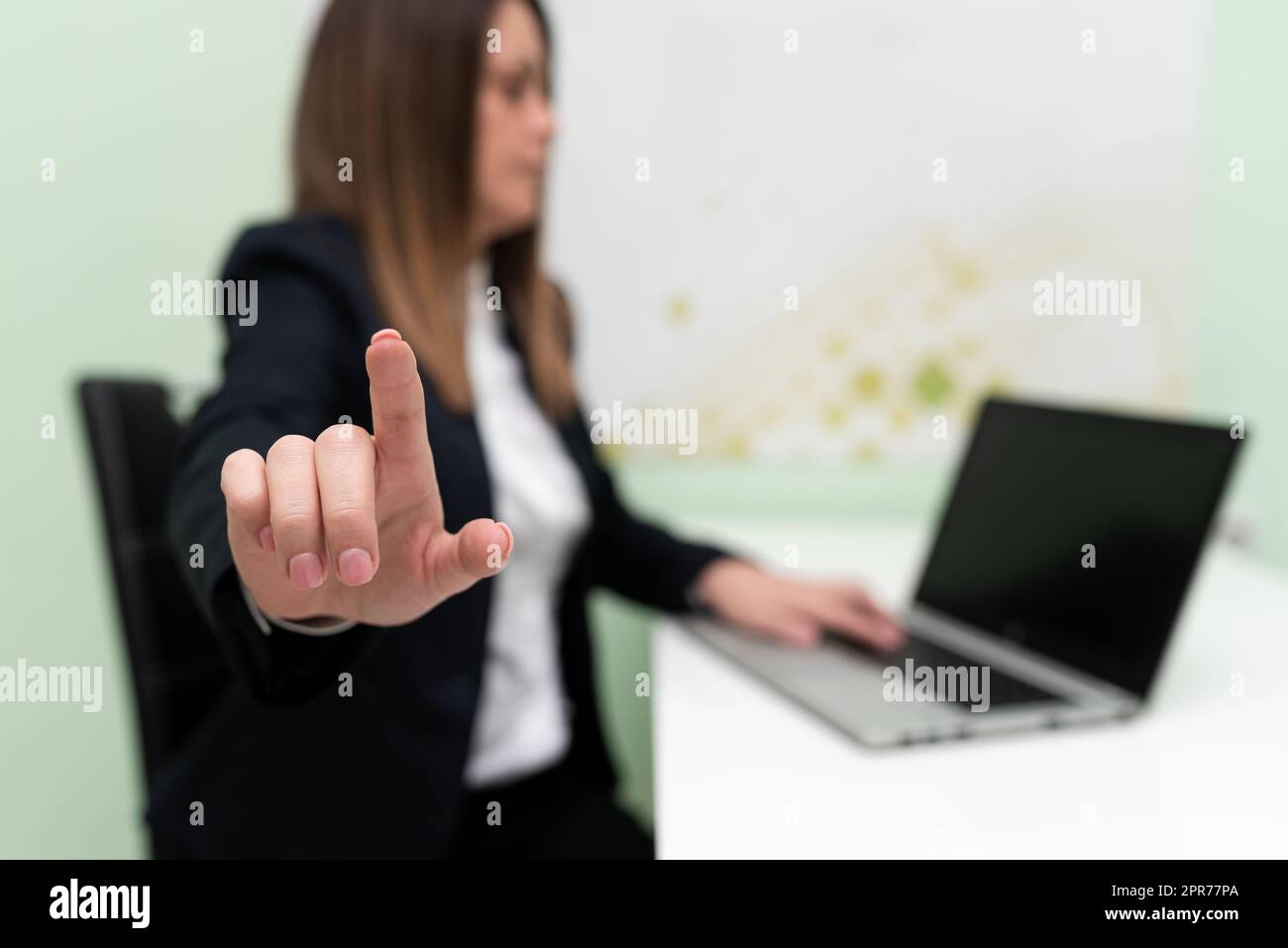 Businesswoman Typing Recent Updates On Lap Top Keyboard On Desk And ...
