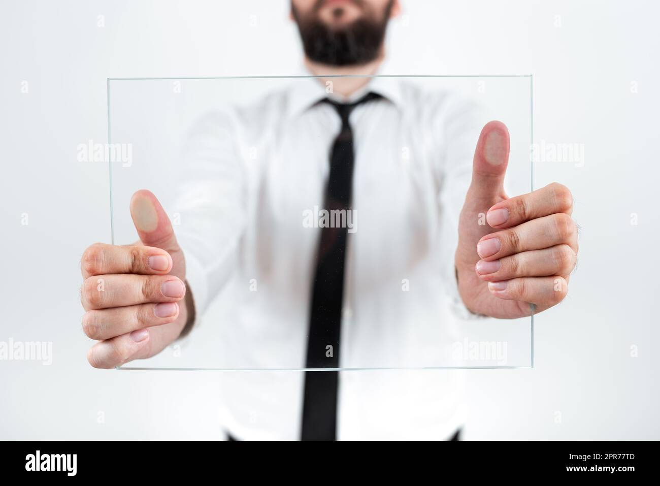 Male Corporate Holding Transparent Glass And Presenting Important Sales ...