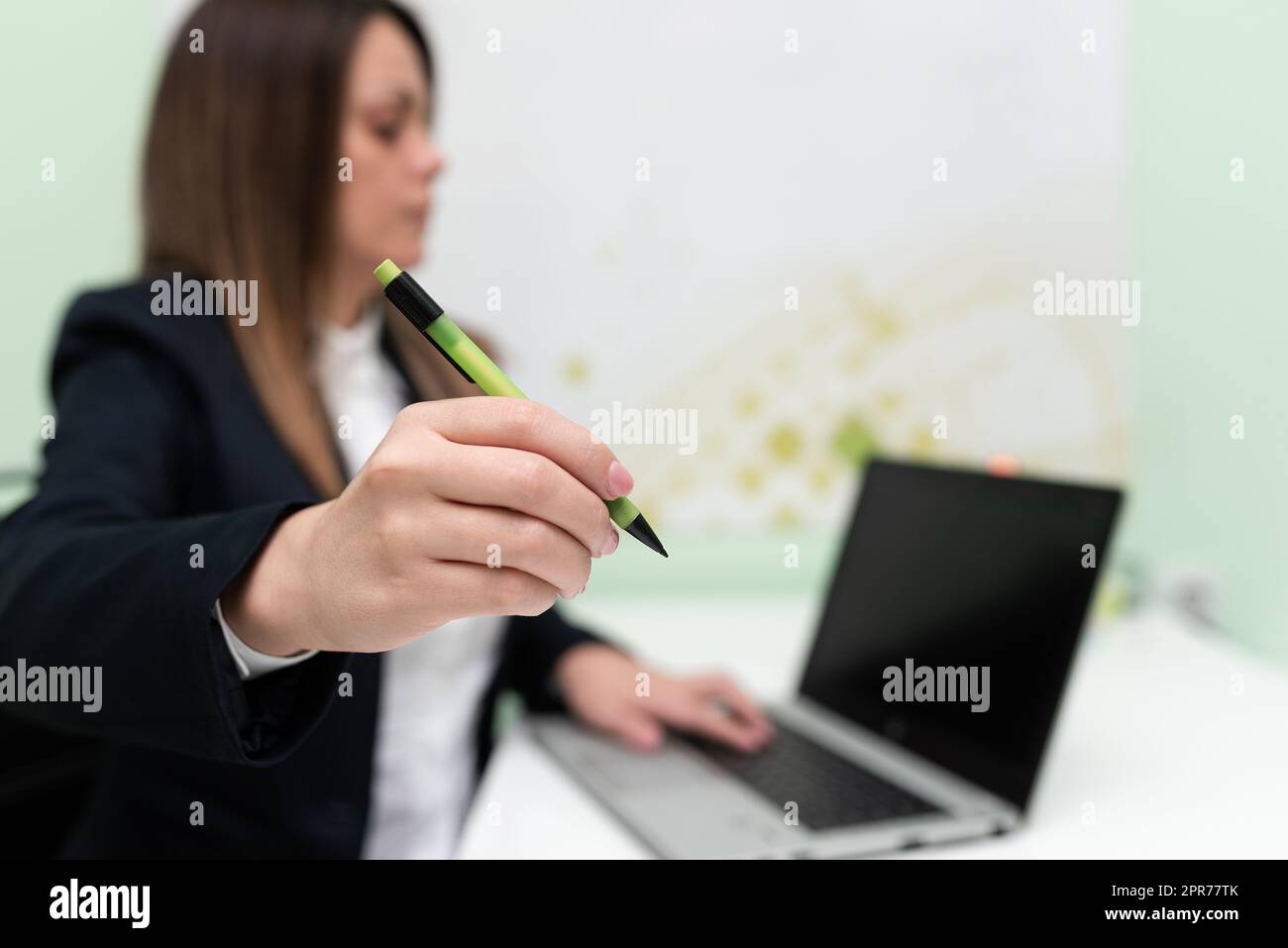 Businesswoman Typing Recent Updates On Lap Top Keyboard On Desk And ...