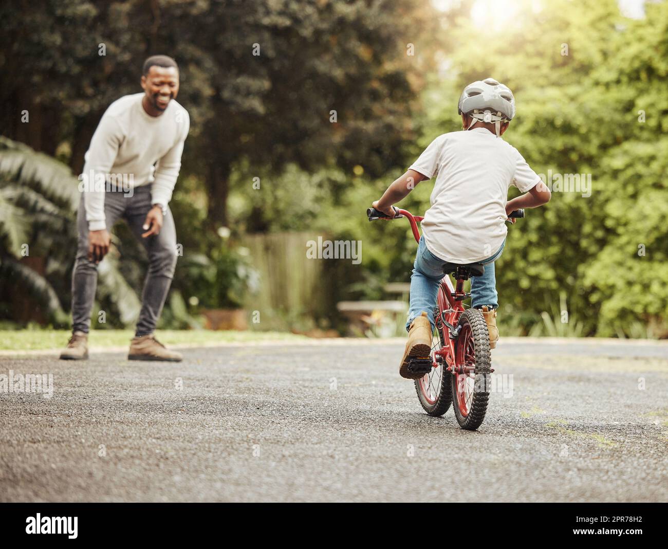 African boy on bicycle hi-res stock photography and images - Alamy