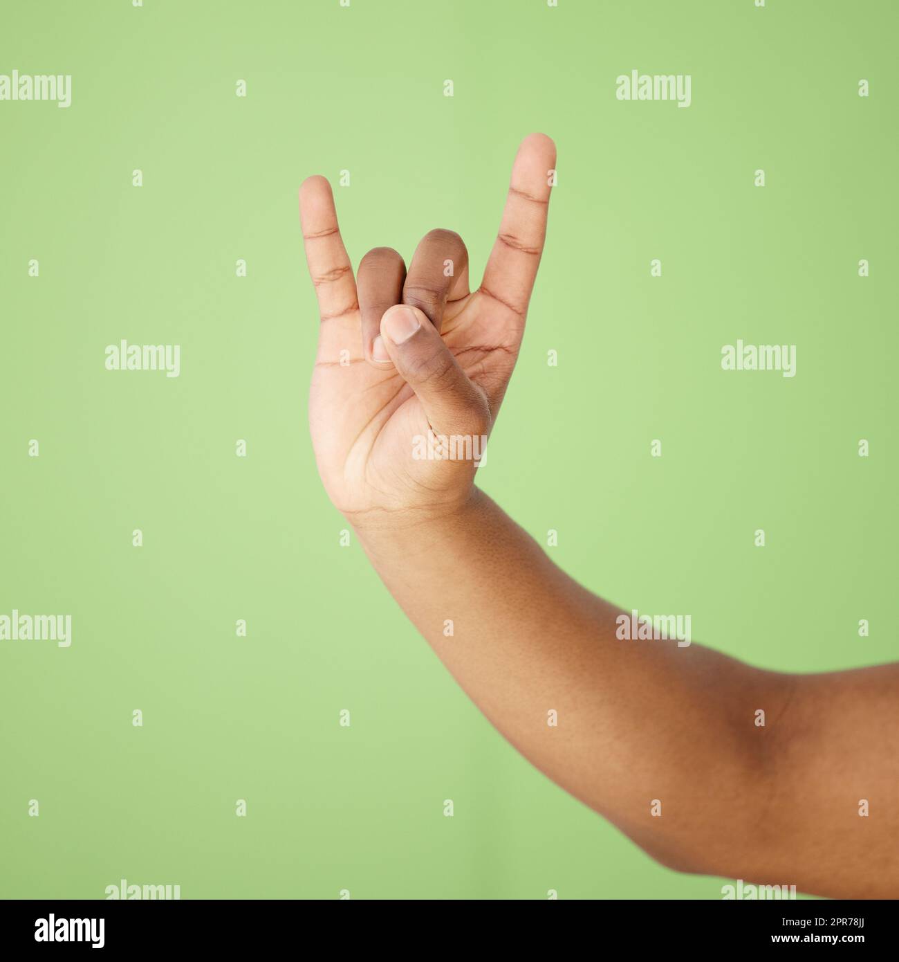 If you know, you know. Cropped shot of a man showing a hand sign ...