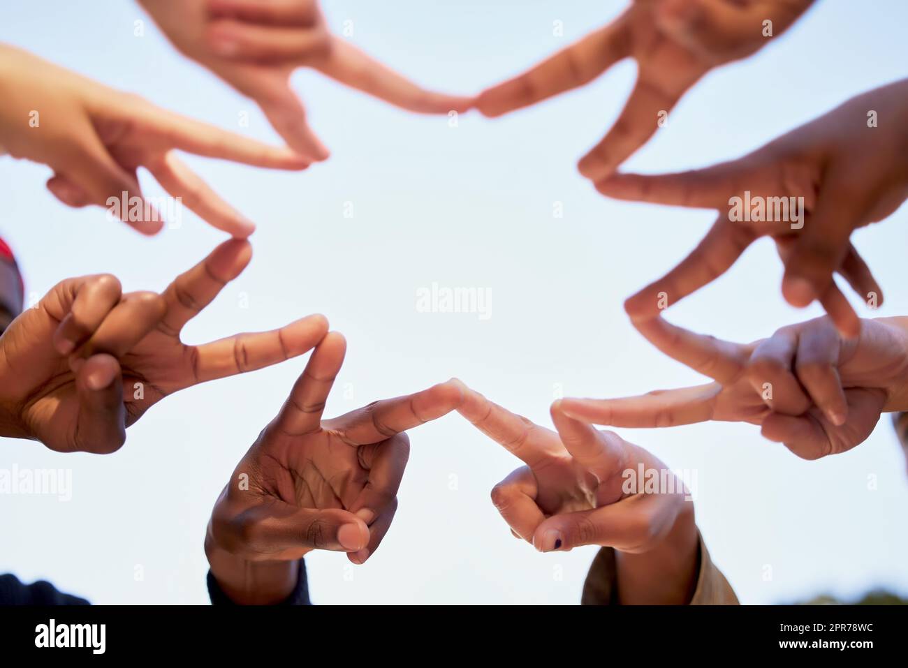 All the right moves. Shot of a group of unrecognizable students joining ...