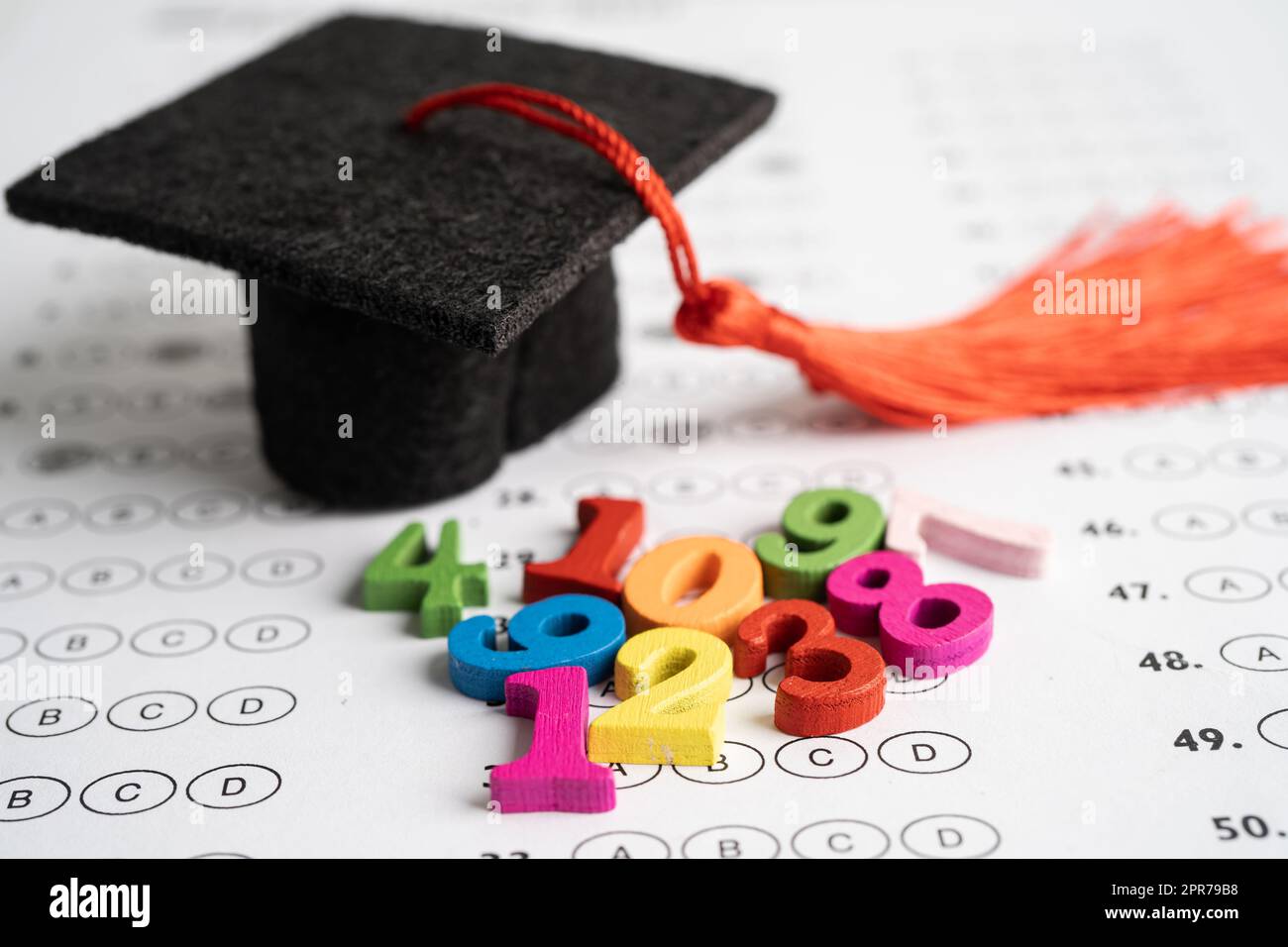 Math Number colorful with graduation hat and pencil on Answer sheet ...