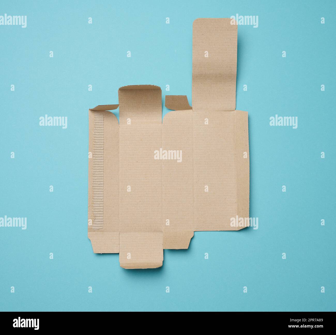 Protective paper from under a box with a perfume, template from white ...