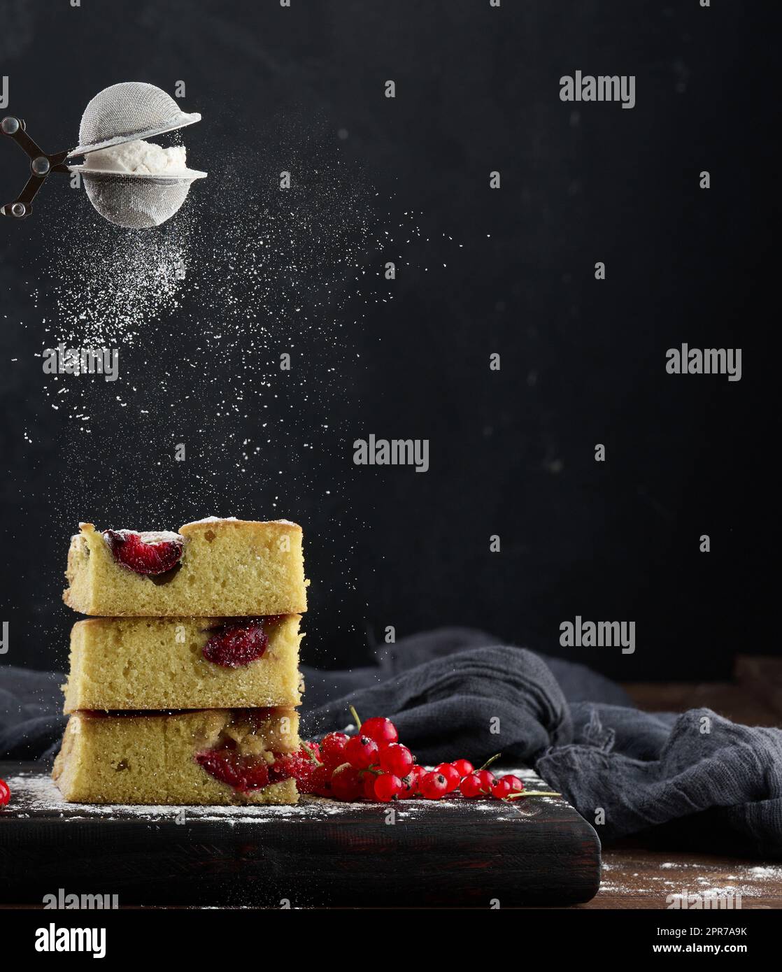 Stack of square slices of baked plum biscuit cake Stock Photo - Alamy